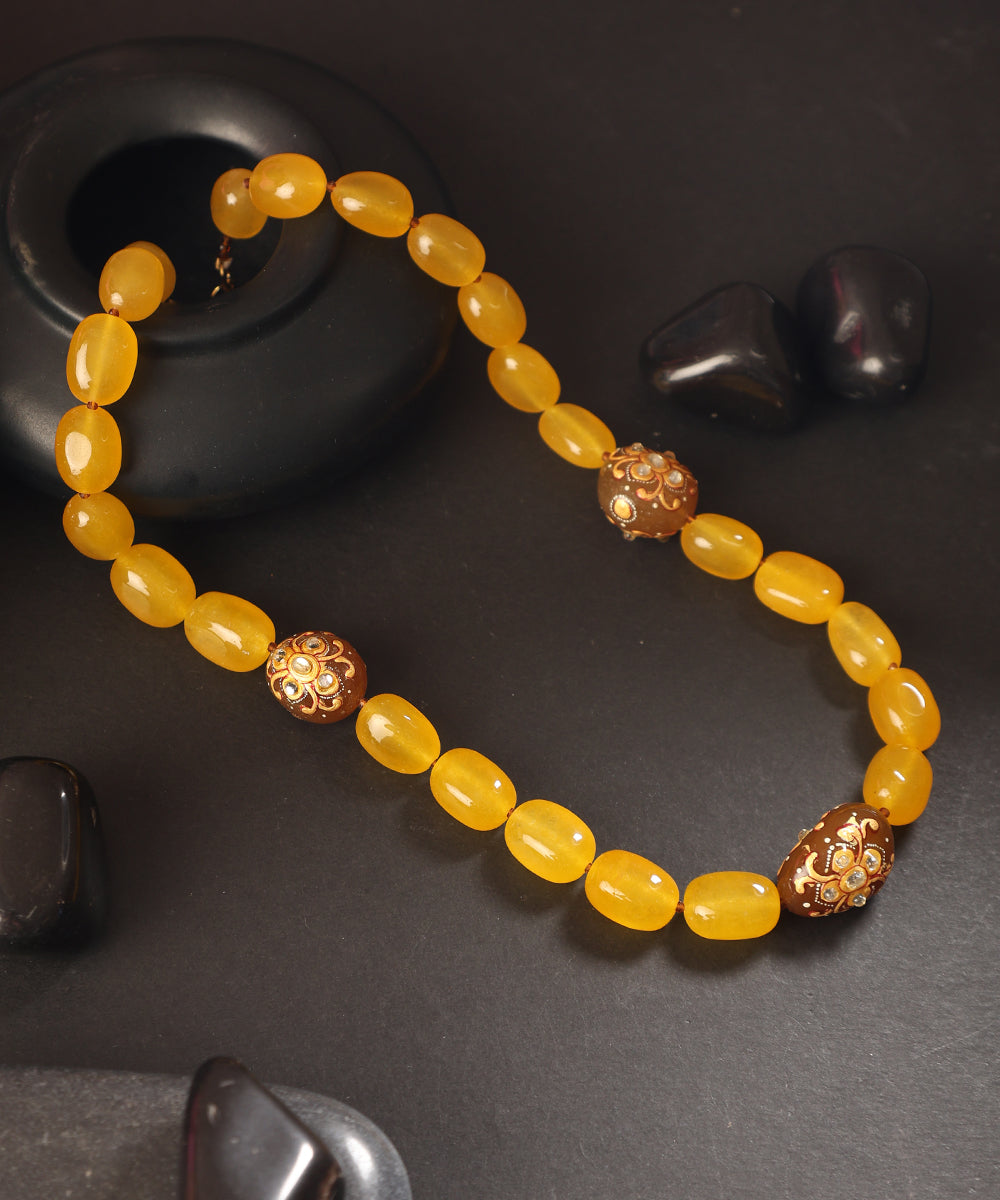 Faryma Orange Handcarfted Alloy Mala with Red Stones – WeaverStory