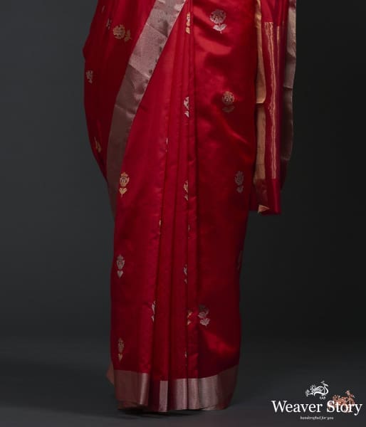 Handwoven chanderi silk saree in bright red color with gold silver mot ...